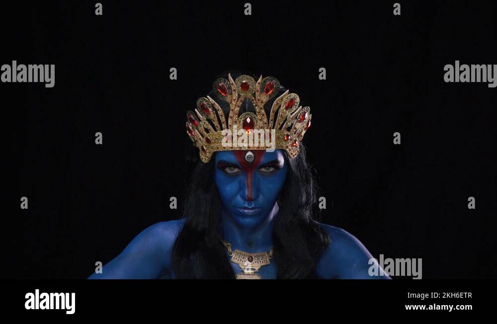 Ancient goddess Kali is crossing two blades and showing her red tongue Stock Video Footage - Alamy