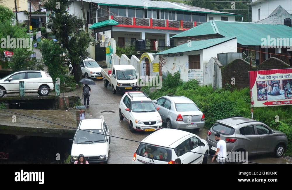 Cars stuck in a traffic jam on the narrow streets of McLeodganj ...