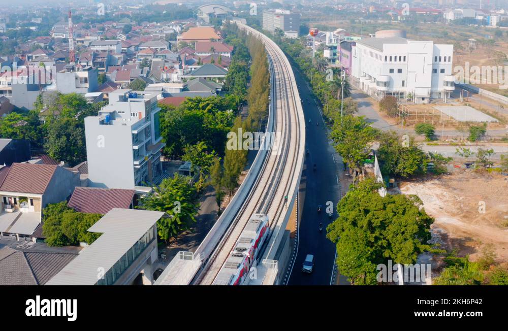 Jakarta MRT moving on the elevated track Stock Video Footage - Alamy