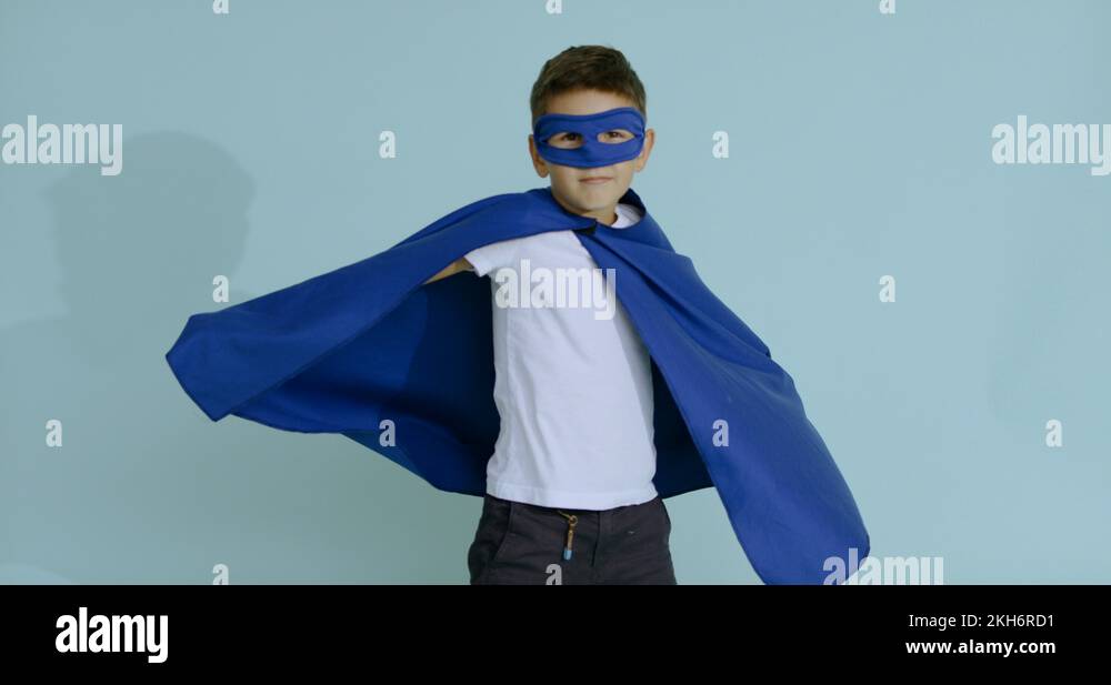1000 FPS Caucasian kid boy wearing superhero cape and mask Stock Video ...