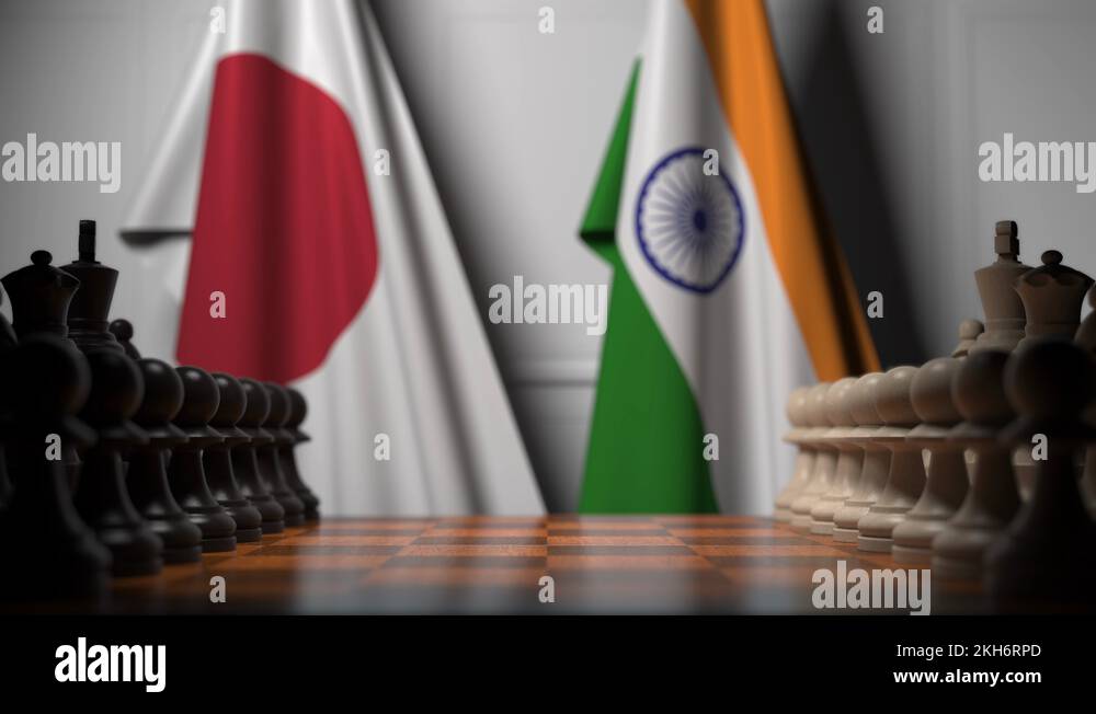 Chess game against flags of Japan and India. Political competition ...