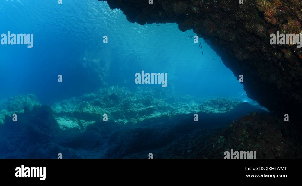 cave diving underwater scuba divers exploring cave dive caverns tunnels ...