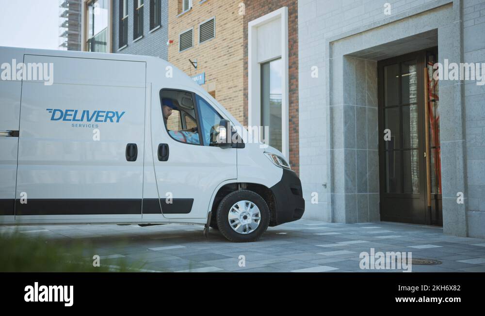 Courier Gets out of Delivery Van, Takes Postal Package Man Gives it to ...