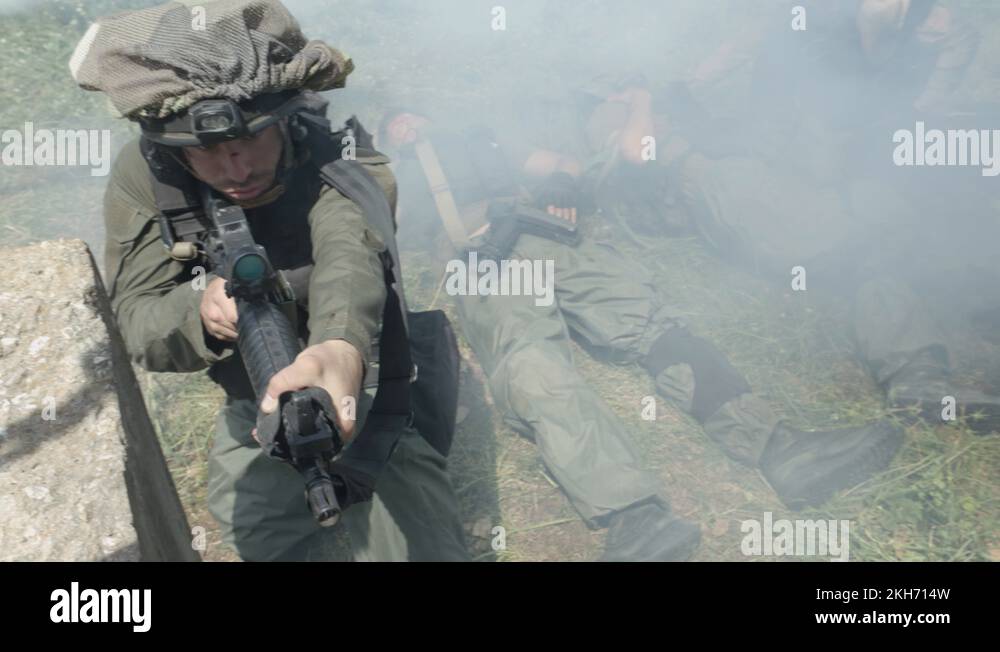 Armed Soldiers Walking Through Field. Israeli Soldier Running With ...