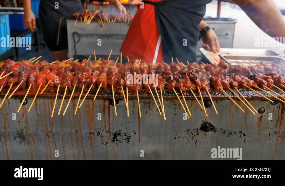 Hot red spicy satay grilled beef on skewer Stock Video Footage - Alamy