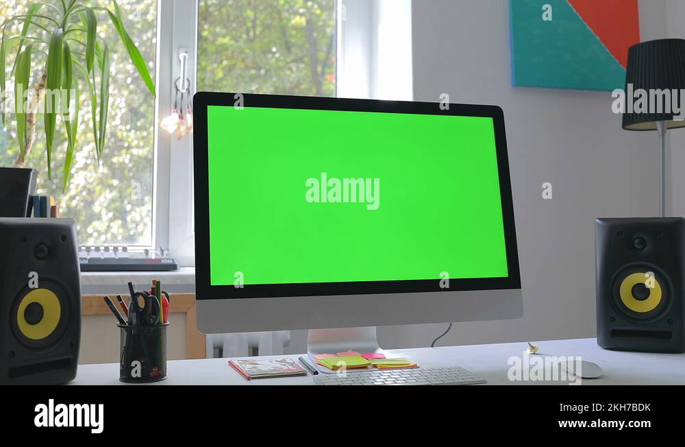 Workplace at loft room with personal computer green screen and chroma ...