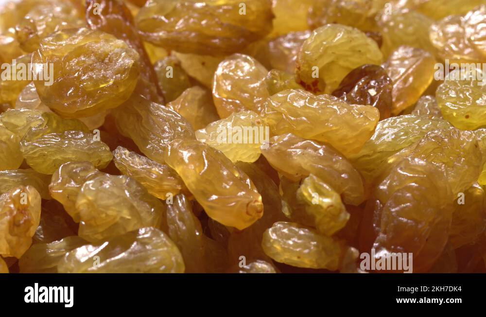 Light raisin largely. Healthy food. Dried fruits. Movement in a circle ...