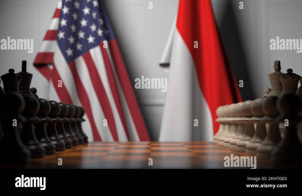 Chess game against flags of USA and Indonesia. Political competition ...