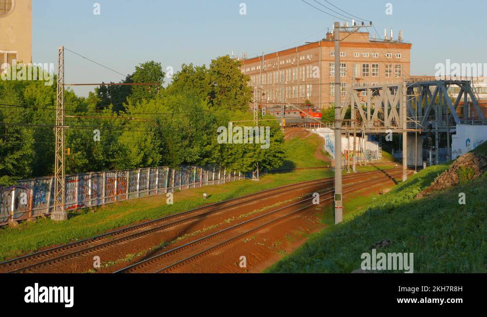 Russian Railways Passenger train at low speed follows through the ...