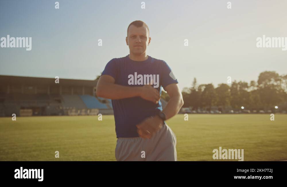 Athletic Disabled Fit Man with Prosthetic Running Blades Poses with ...