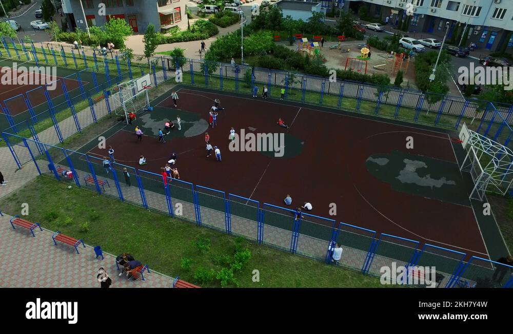 Boys playing football in courtyard Stock Videos & Footage - HD and 4K ...