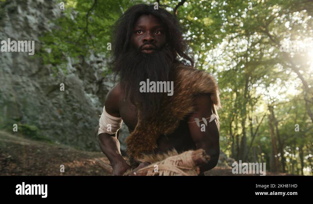 African huntsman of hunter-getherers ancient tribe hunting for animal ...