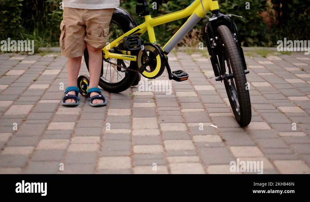 Child ride bike on bicycle path kid ride a bike Stock Videos & Footage ...