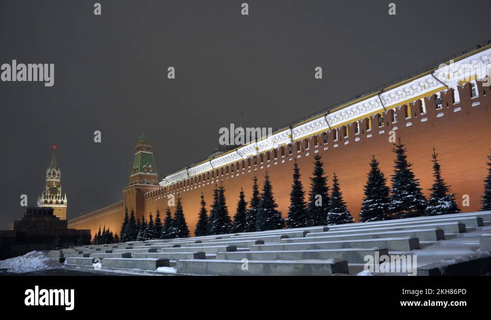 Kremlin wall. The famous clock tower and red star on top. Mausoleum of ...