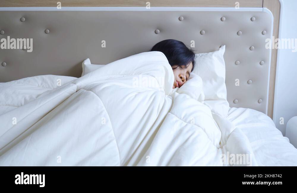 Woman unwell bed Stock Videos & Footage - HD and 4K Video Clips - Alamy