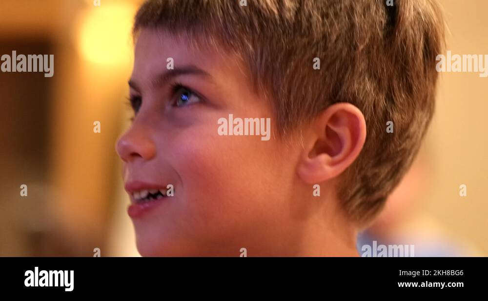 Real life child reaction watching movie screen Stock Video Footage - Alamy