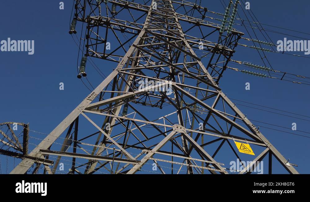 Tilt down from overhead electricity grid pylon to gas fired power ...