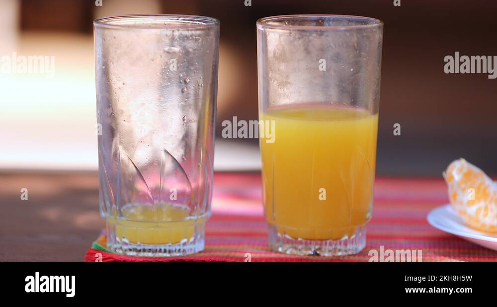 Glass half full juice Stock Videos & Footage - HD and 4K Video Clips ...