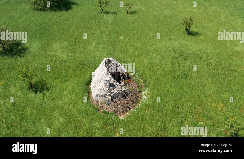 A traditional dry stone hut with a conical roof Stock Videos & Footage ...