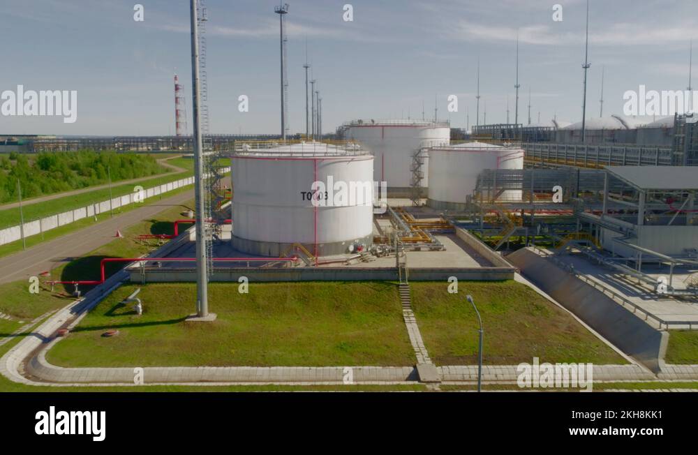 gas tanks with pipeline system at refinery complex aerial Stock Video ...