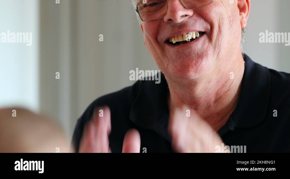 Older man spontaneous real life authentic smile and happy emotion ...