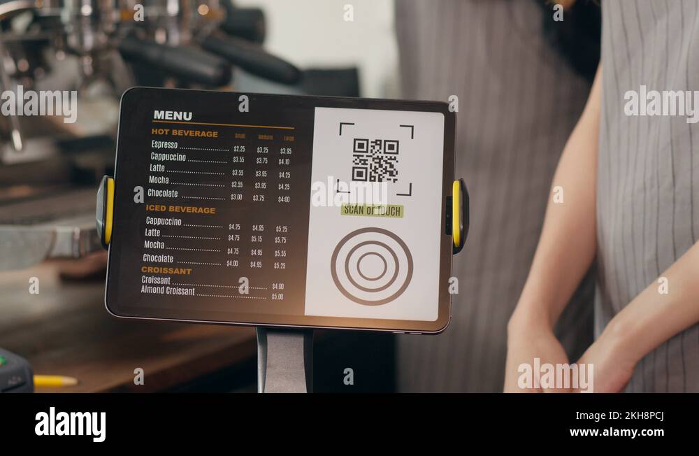 Young Asian woman self service order drink menu with tablet screen at ...