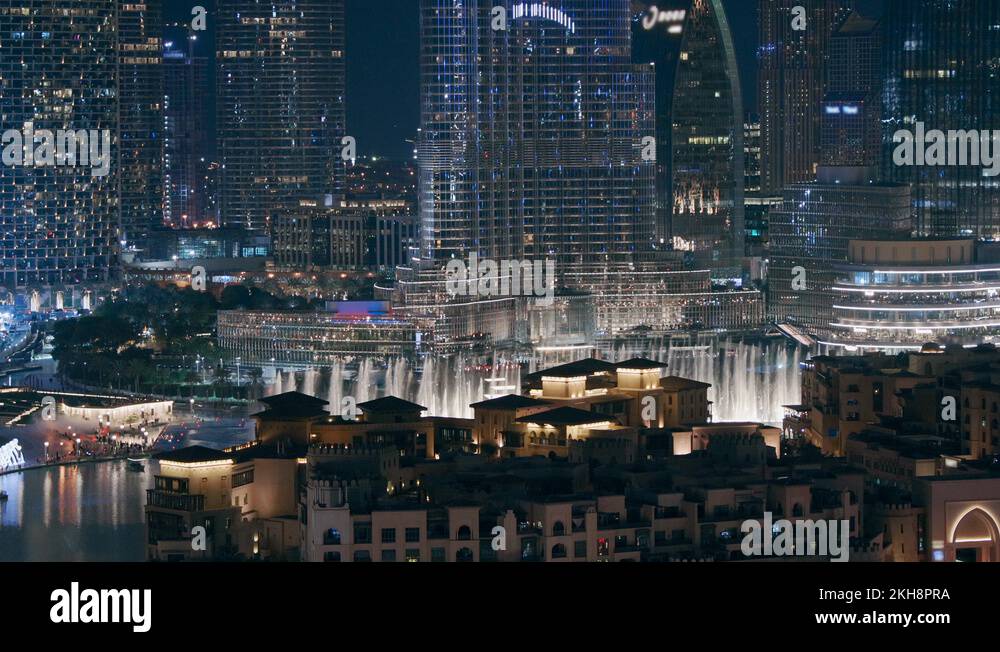 Dubai Downtown skyline at night with fountain and towers paniramic view ...