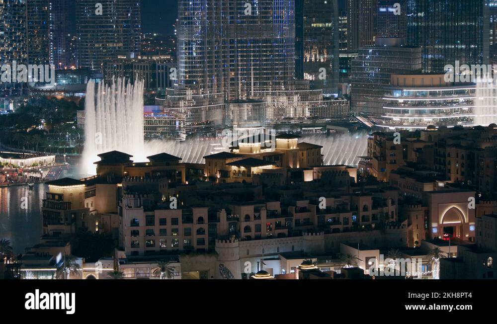 Dubai Downtown skyline at night with fountain and towers paniramic view ...