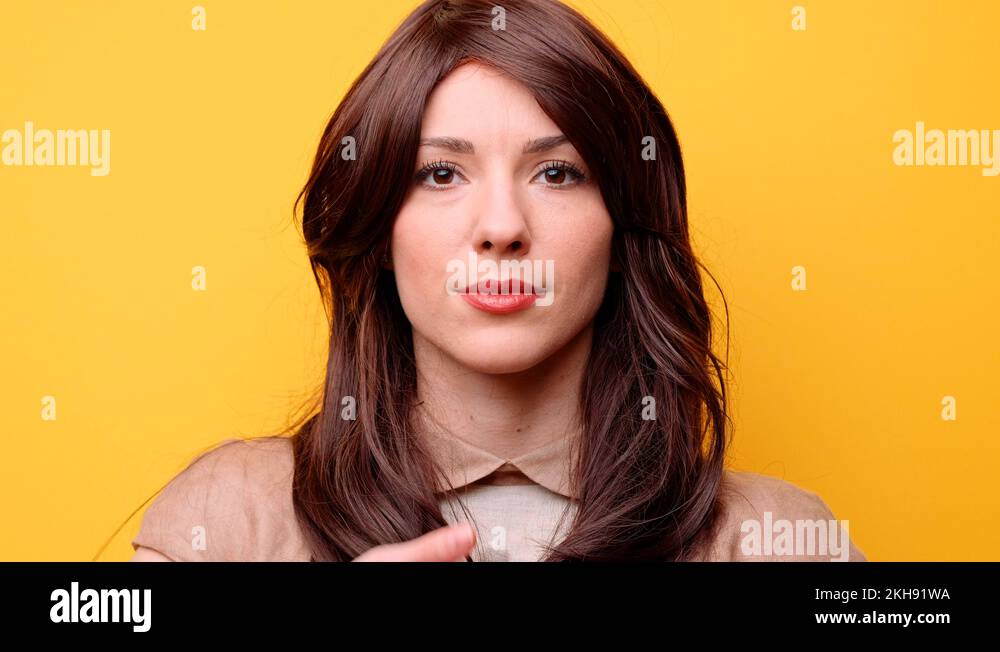 Funny changing style and emotions. Woman in wig with long hair taking ...