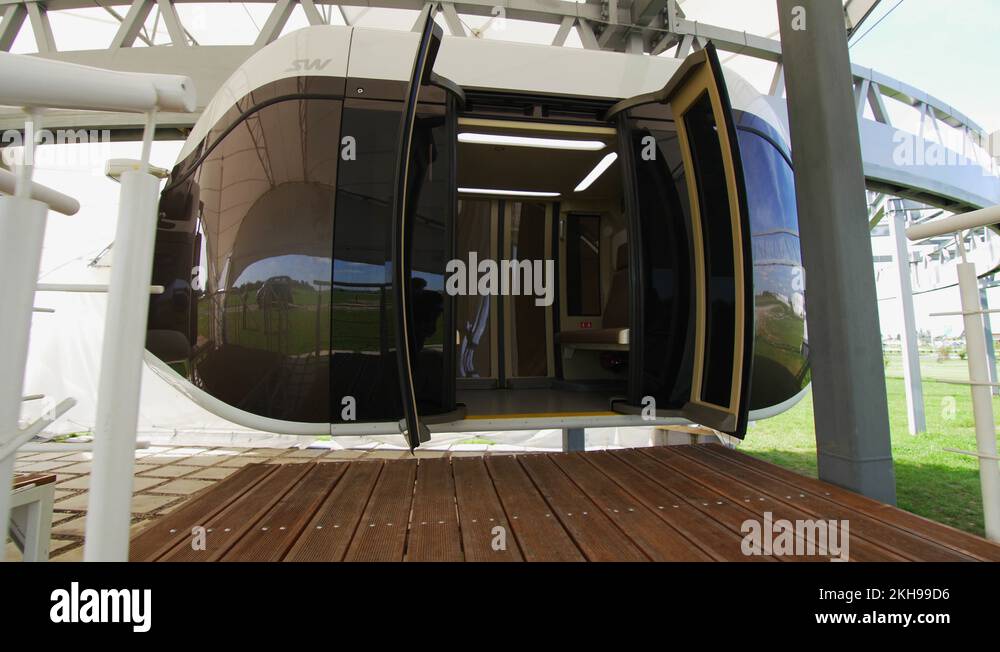 motion to unibus salon with open doors on overpass station Stock Video ...