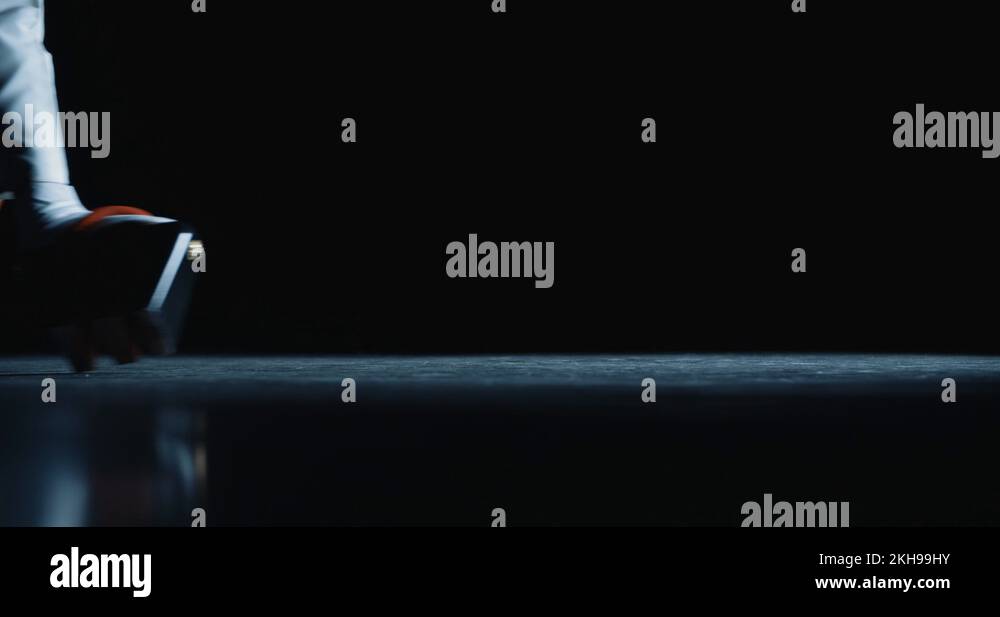 Japanese geisha in traditional kitsune costume and on geta sandals ...