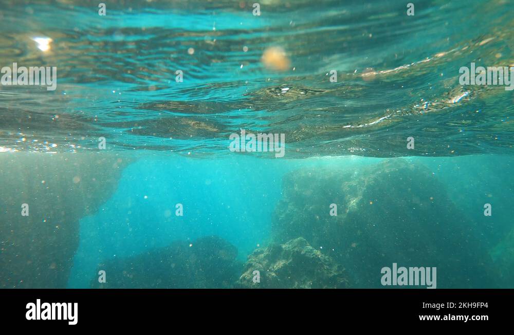 Beautiful underwater sea scene view with natural light rays, shining ...