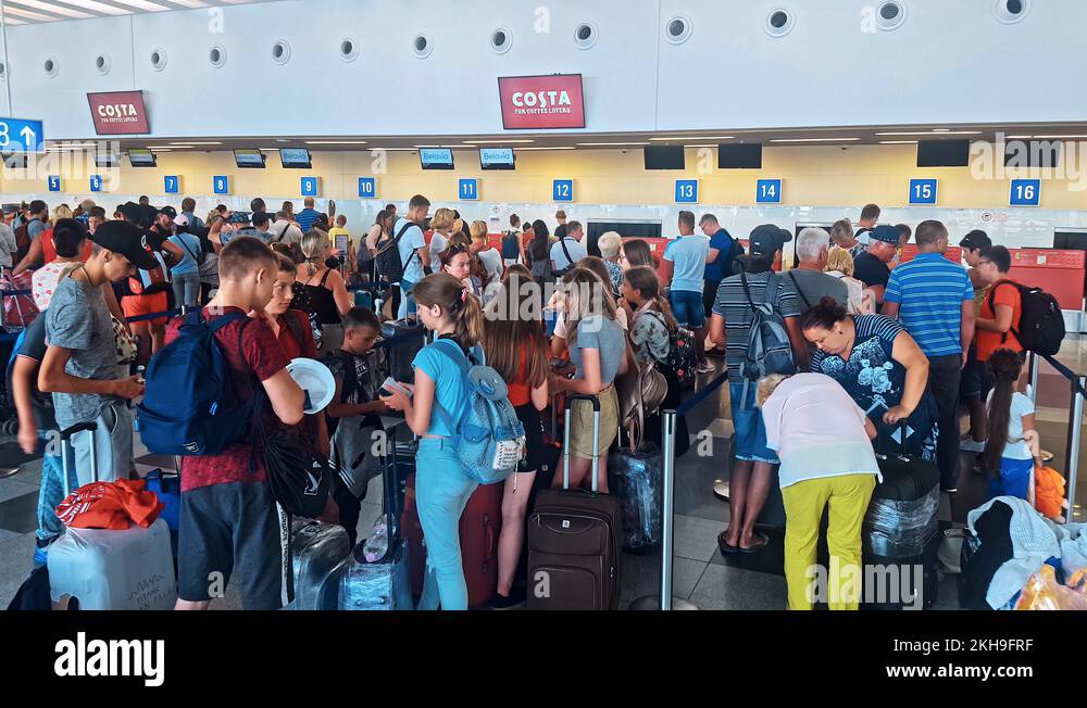 Queue of people waiting at boarding gate at airport Stock Video Footage ...