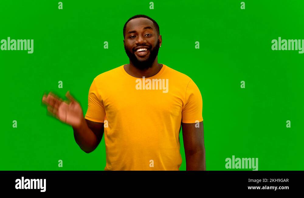 Laughing man welcoming, waving hand and saying "hi". Alpha channel ...