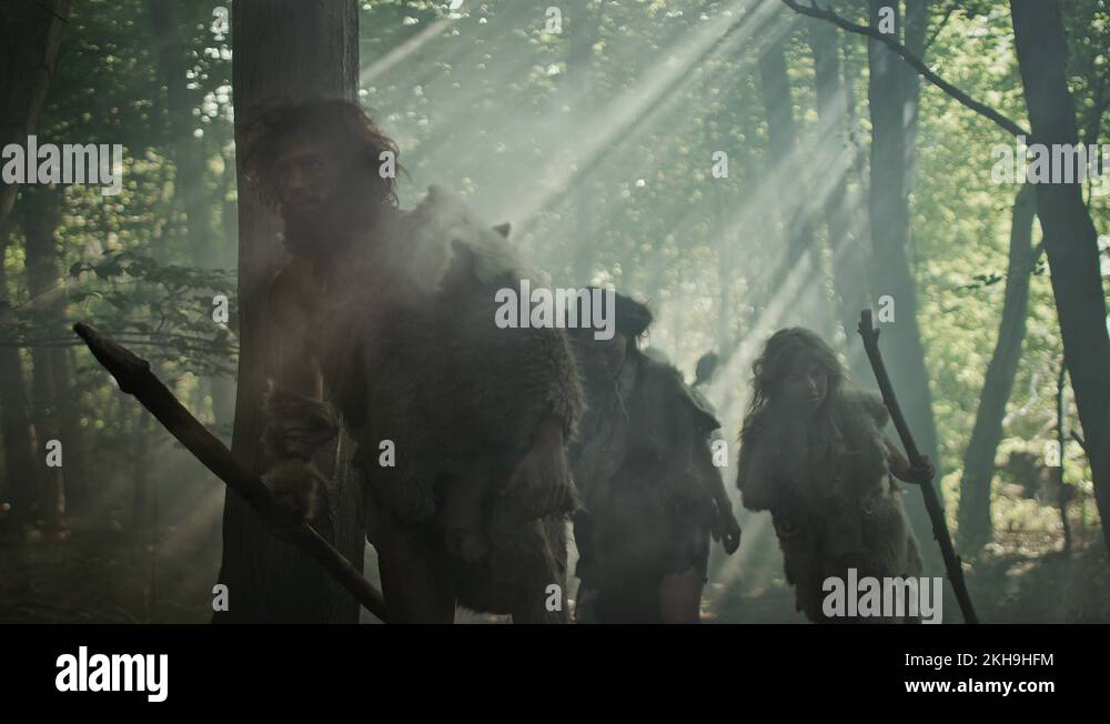 Tribe of Hunter-Gatherers Wearing Animal Skin Holding Stone Tipped ...
