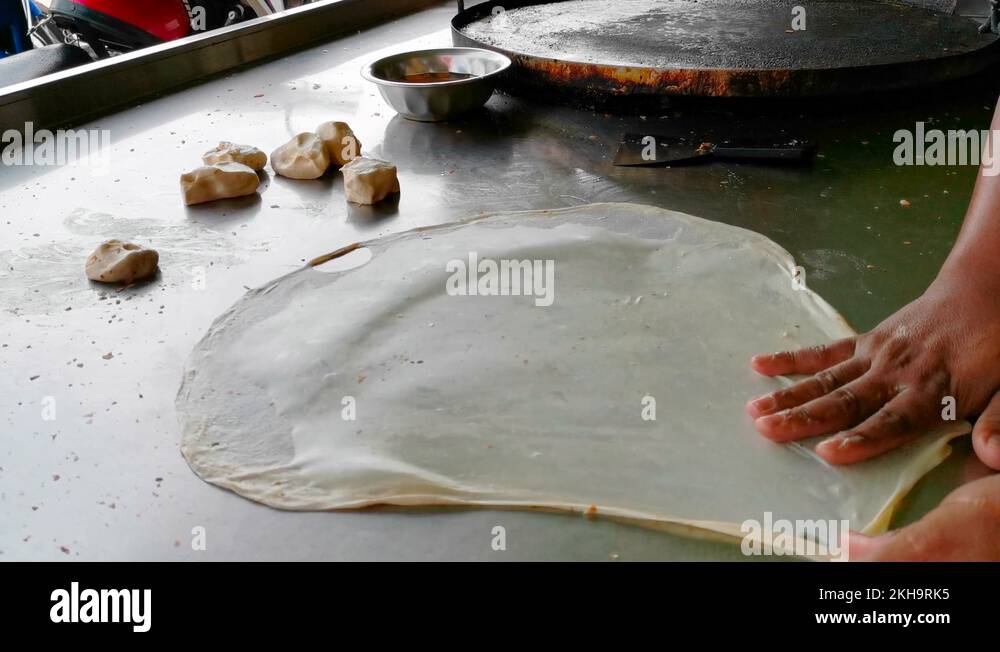 Clips of Roti Parata or Roti canai in the making process Stock Video ...