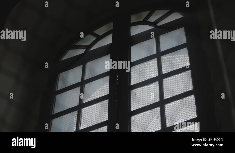 Communist Prison - cross-windows with rays Stock Video Footage - Alamy