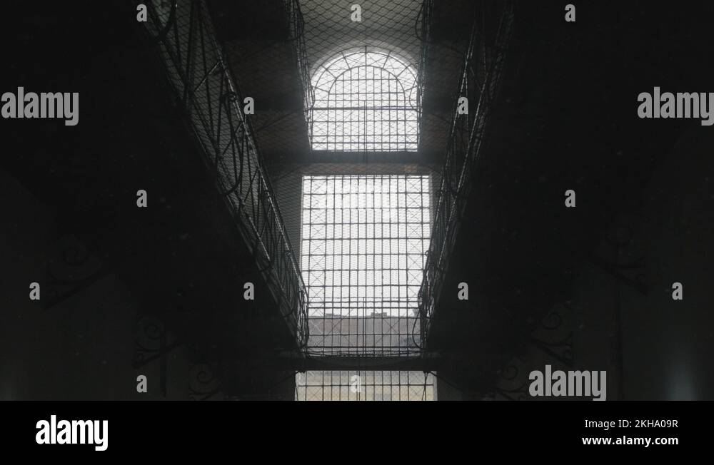 Communist Prison - the guard patrolling on the first floor Stock Video ...
