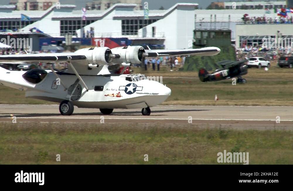 Flying boat PBY-5A Catalina American naval patrol bomber steers on ...