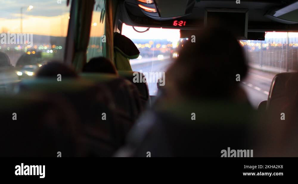 Passenger perspective POV while traveling by bus shuttle through ...