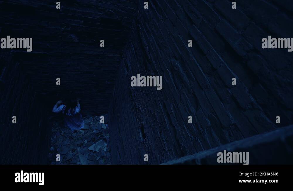 Terrified woman knocking on blind wall, helpless prisoner crying in ...