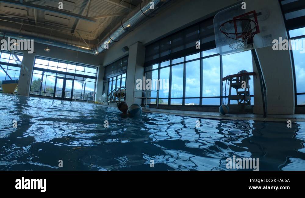A boy diving in swimming pool indoor Stock Videos & Footage - HD and 4K ...
