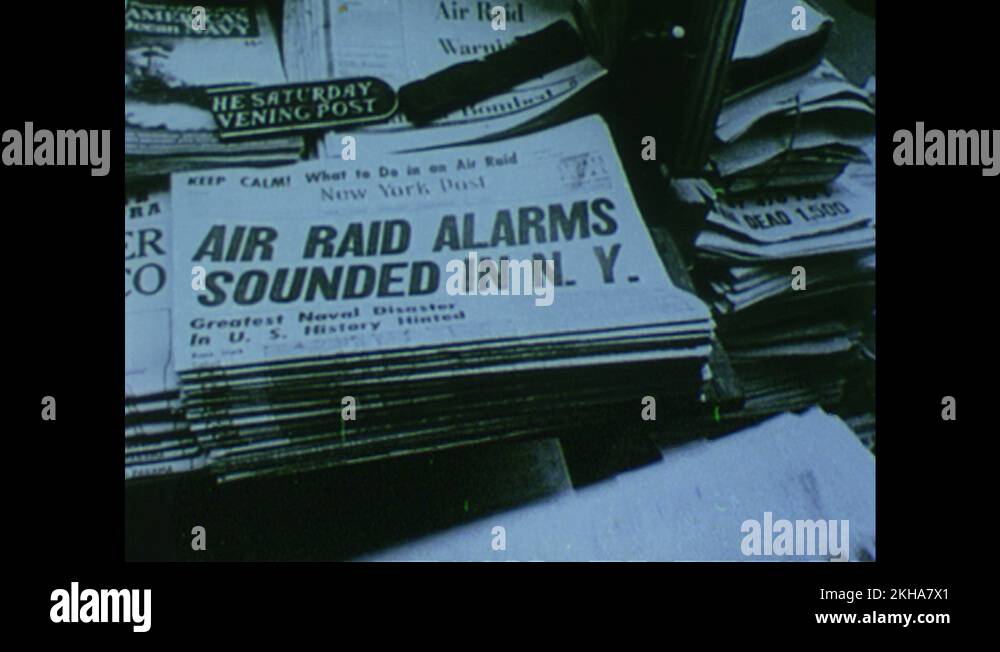 1940s: UNITED STATES: Soldiers sight planes. People in air raid shelter ...