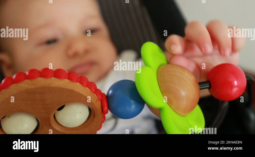 Baby hand toy Stock Videos & Footage - HD and 4K Video Clips - Alamy