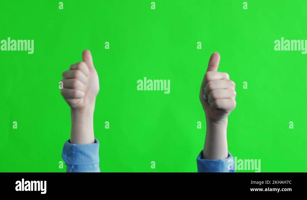 Thumbs up sign hand gesture on green screen. Simbol of approval like ...