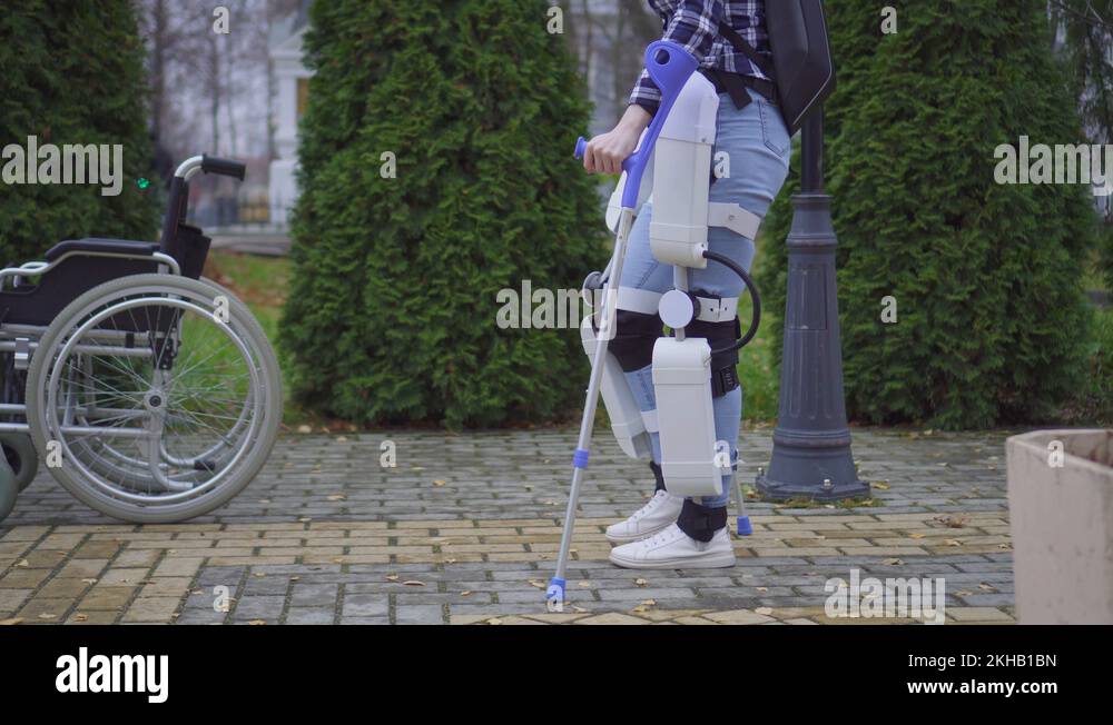 paralyzed man learns to walk again with robotic exoskeleton Stock Video ...