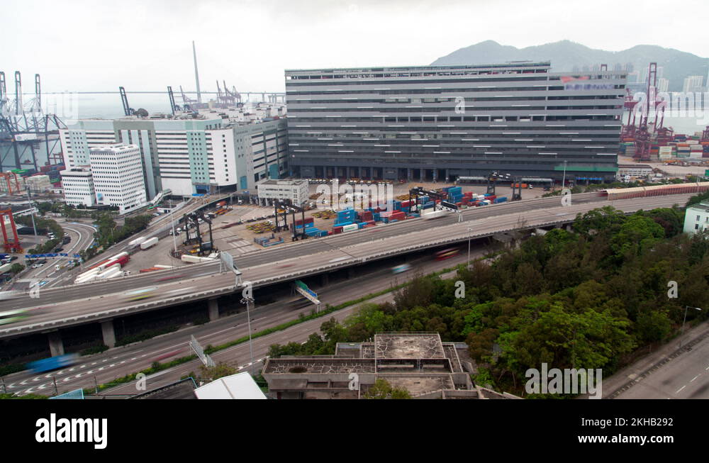 Container terminal cranes operate loading cargo vessel in Hong Kong ...