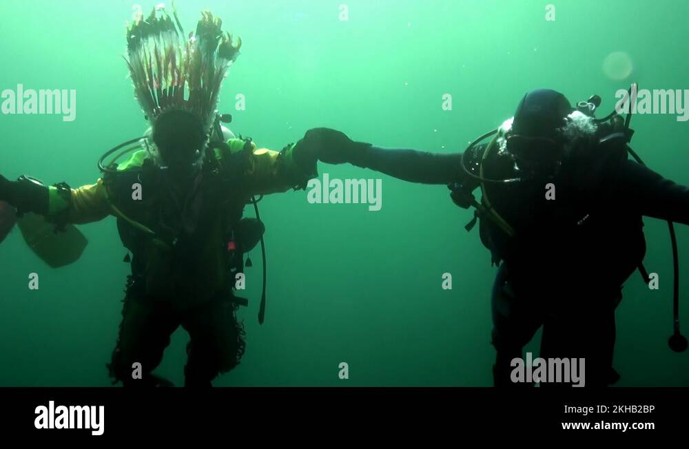 Holiday and scuba diving in New Year near underwater Christmas tree ...