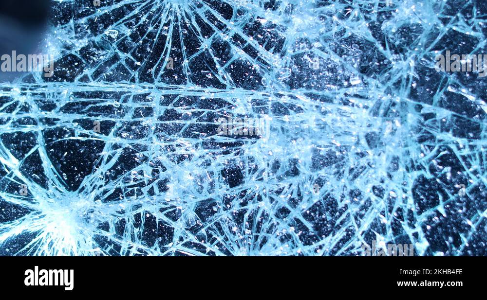 Shattering glass screen with a hammer. Breaking and cracking screen on ...