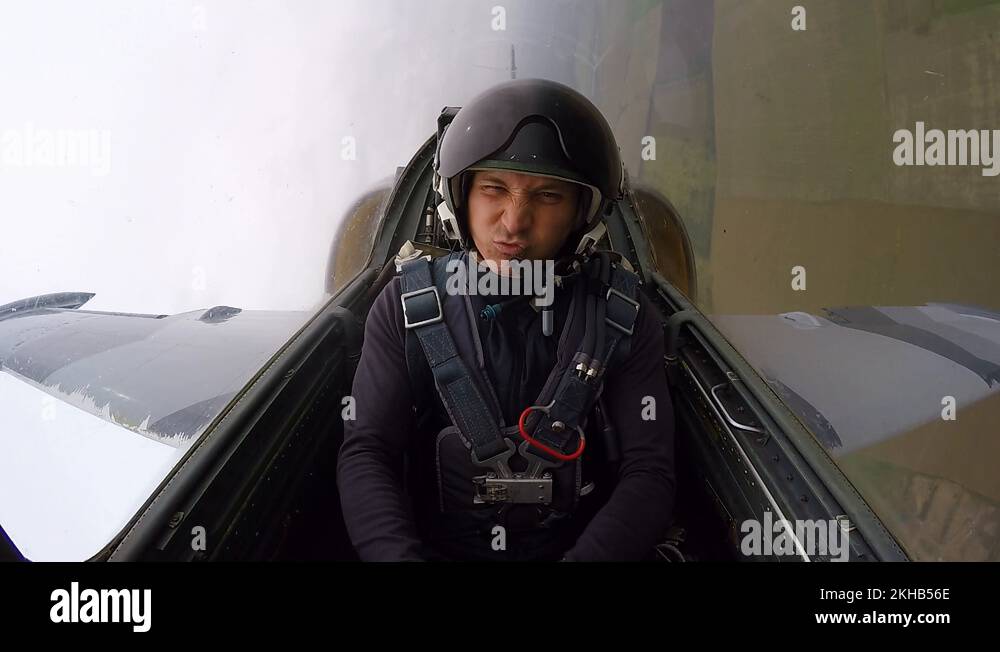 Jet plane make barrel roll. Pilot man dreaming that shoots from a ...